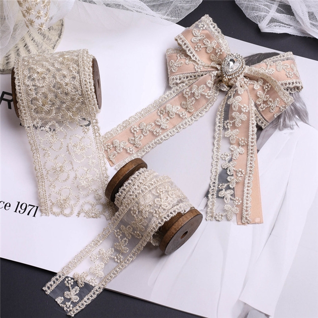 embroidered lace with wavy edge and lamé ribbon david accessories on ...